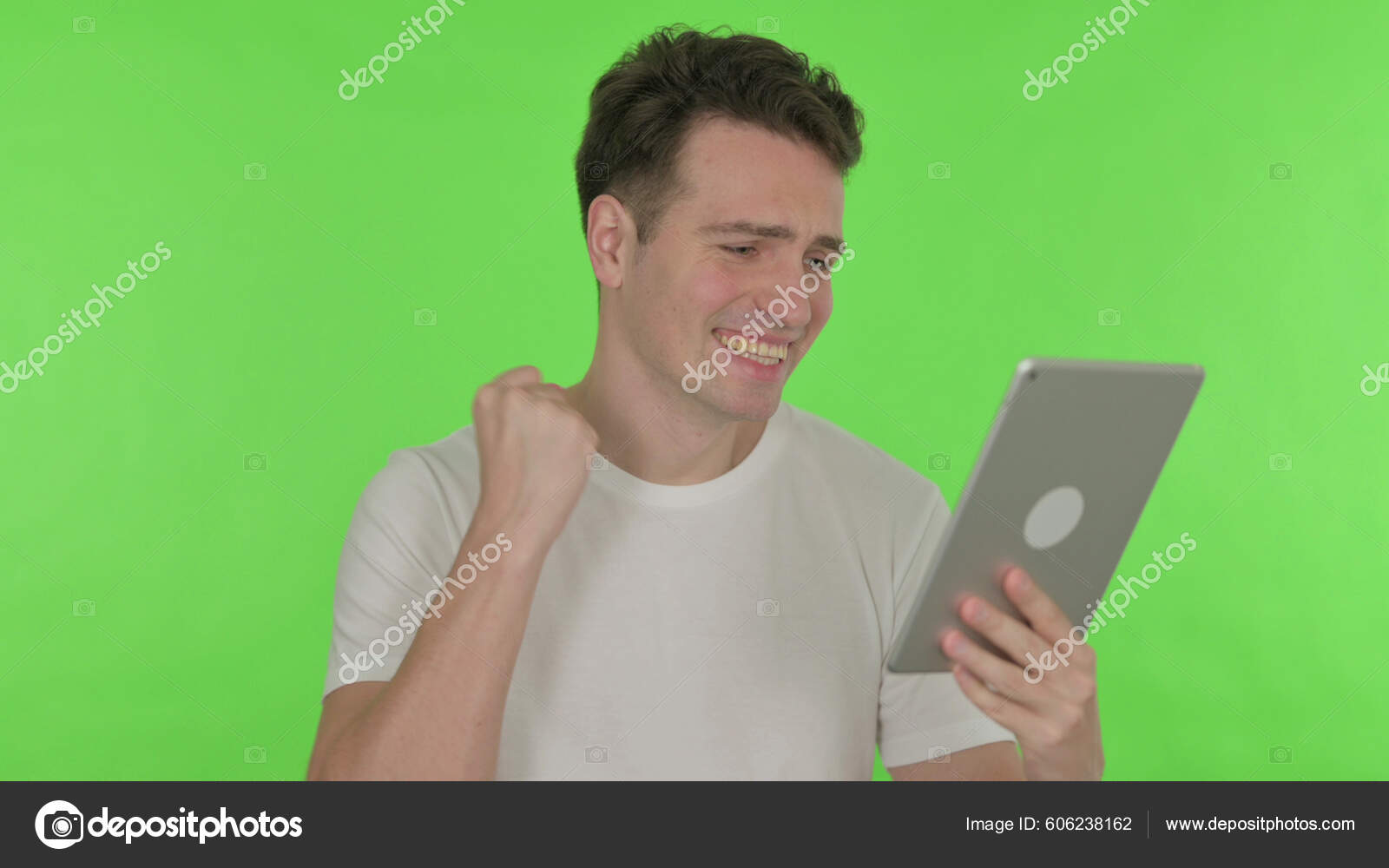 Casual Young Man Celebrating Success Tablet Green Background — Stock ...