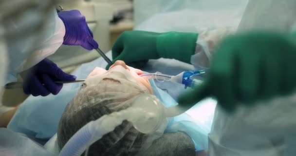 Surgical operation to remove a tooth under anesthesia Stock Video ...