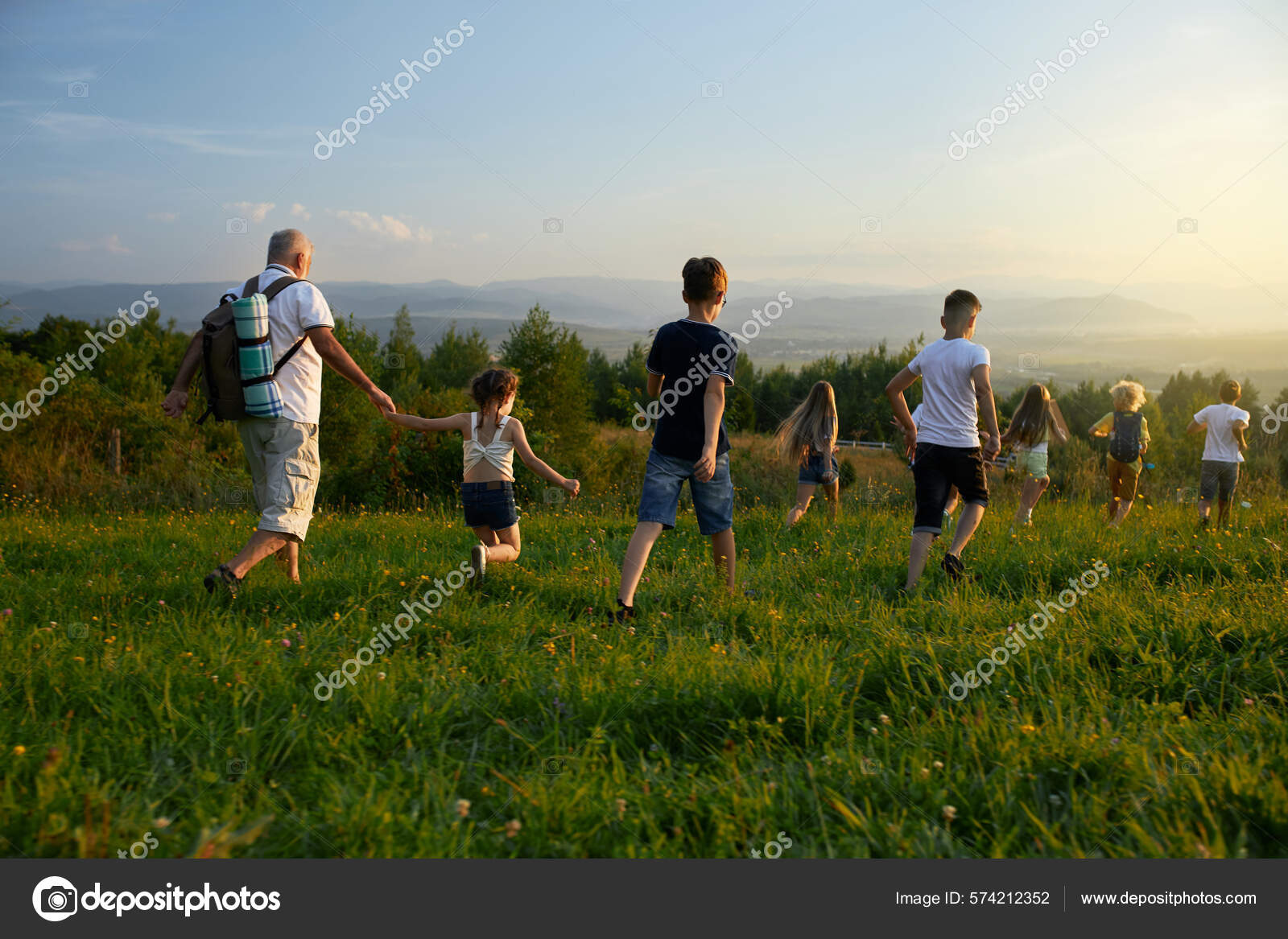 Back View Kids Old Man Leading Each Other Forward Hills Stock Photo by ...