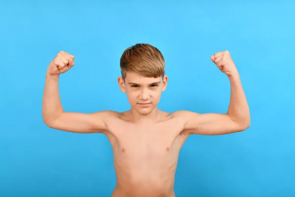 Kid flexing muscles Stock Photos, Royalty Free Kid flexing muscles ...