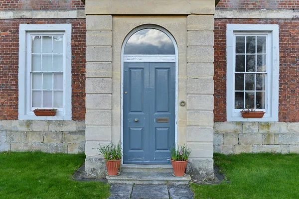 Front View Building Door Stock Photo by ©1000Words 416205780