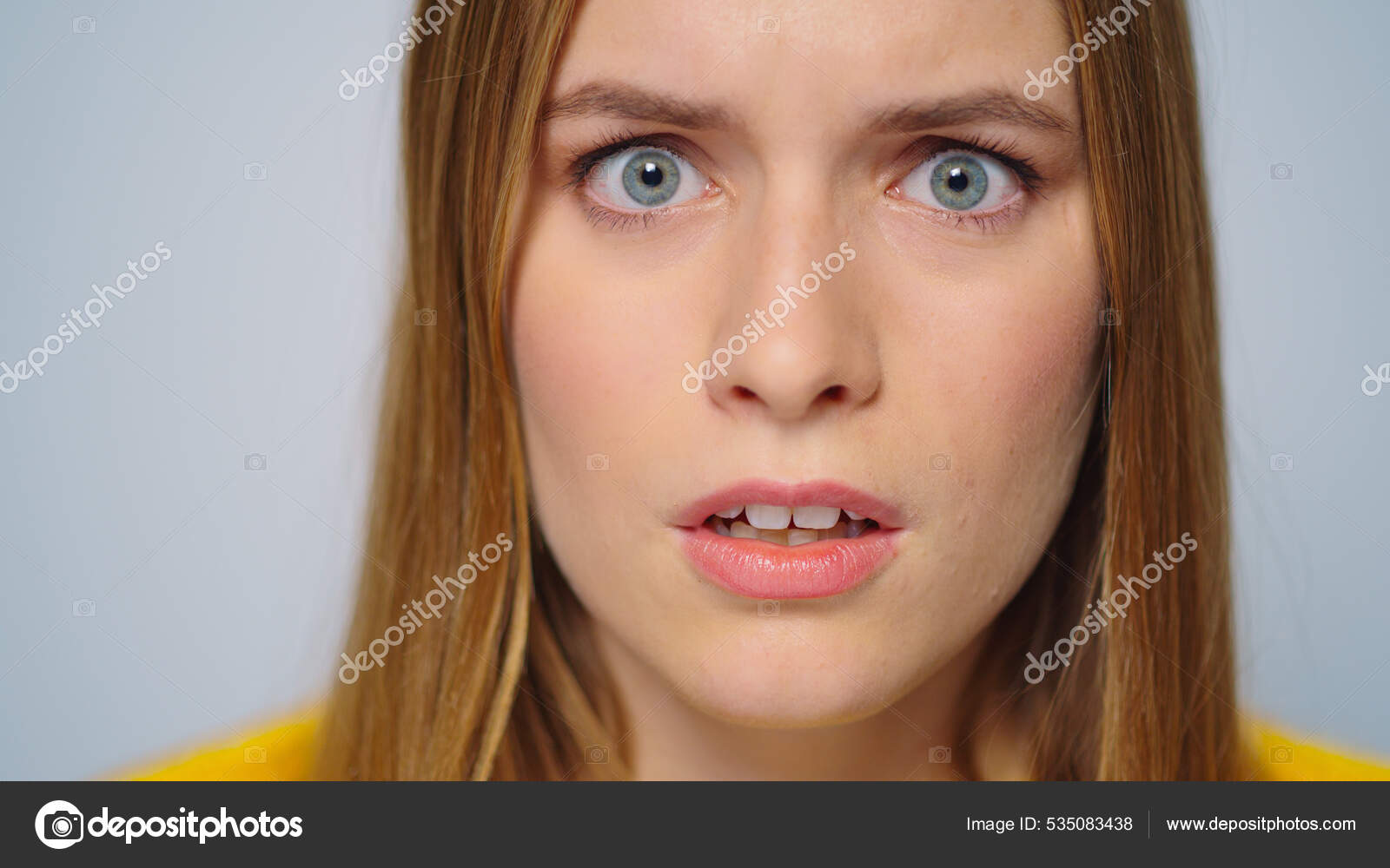 Woman Looking Upward In Shock