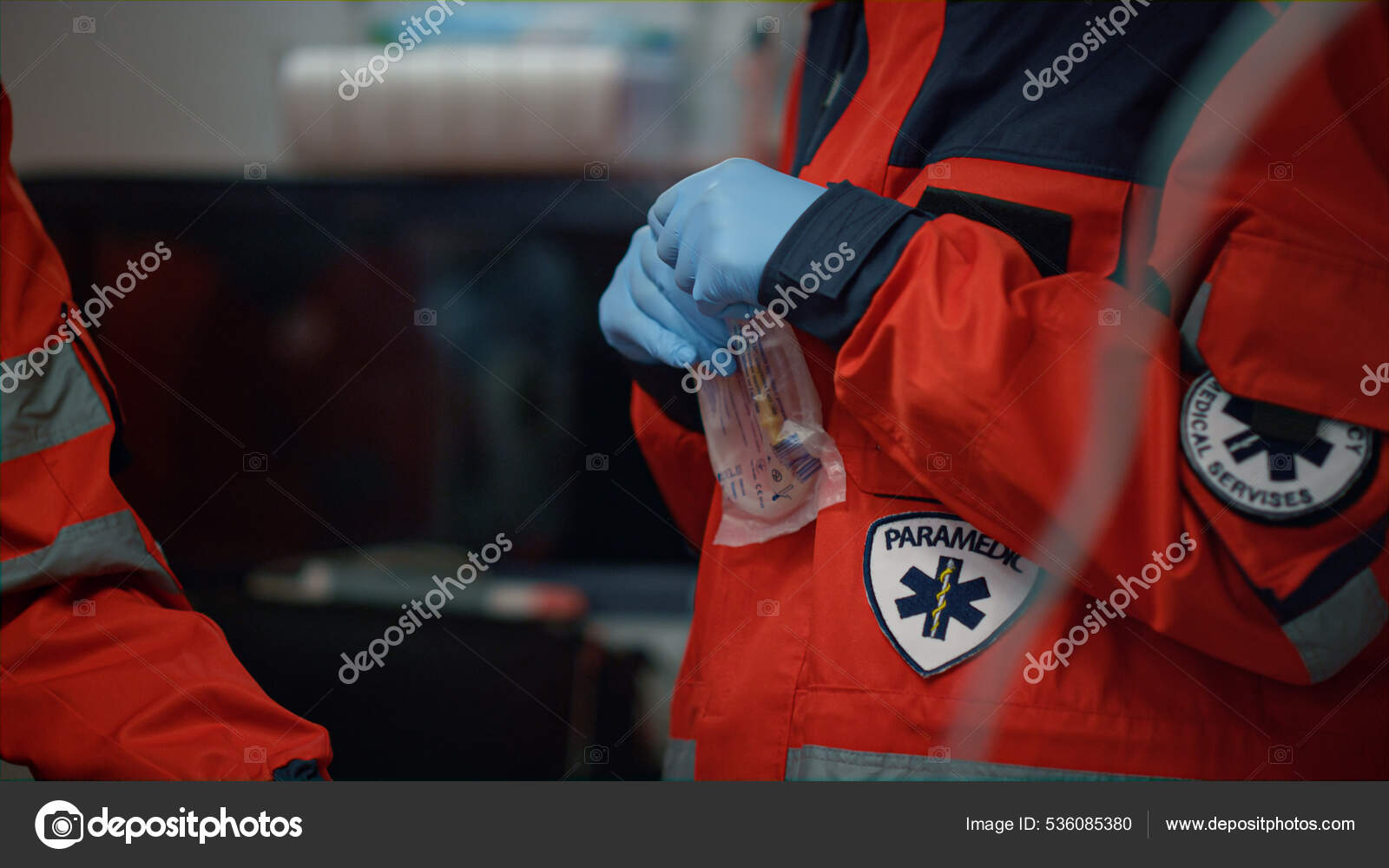 Medical team rescuing patient after car accident in emergency vehicle ...