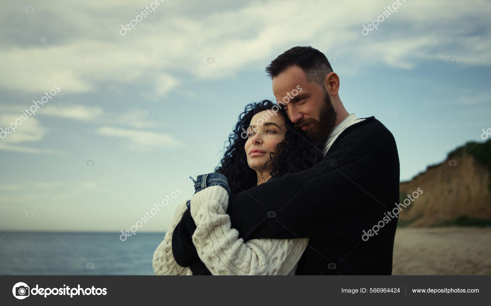 Romantic people hugging at seaside beach. Calm couple showing love on ...