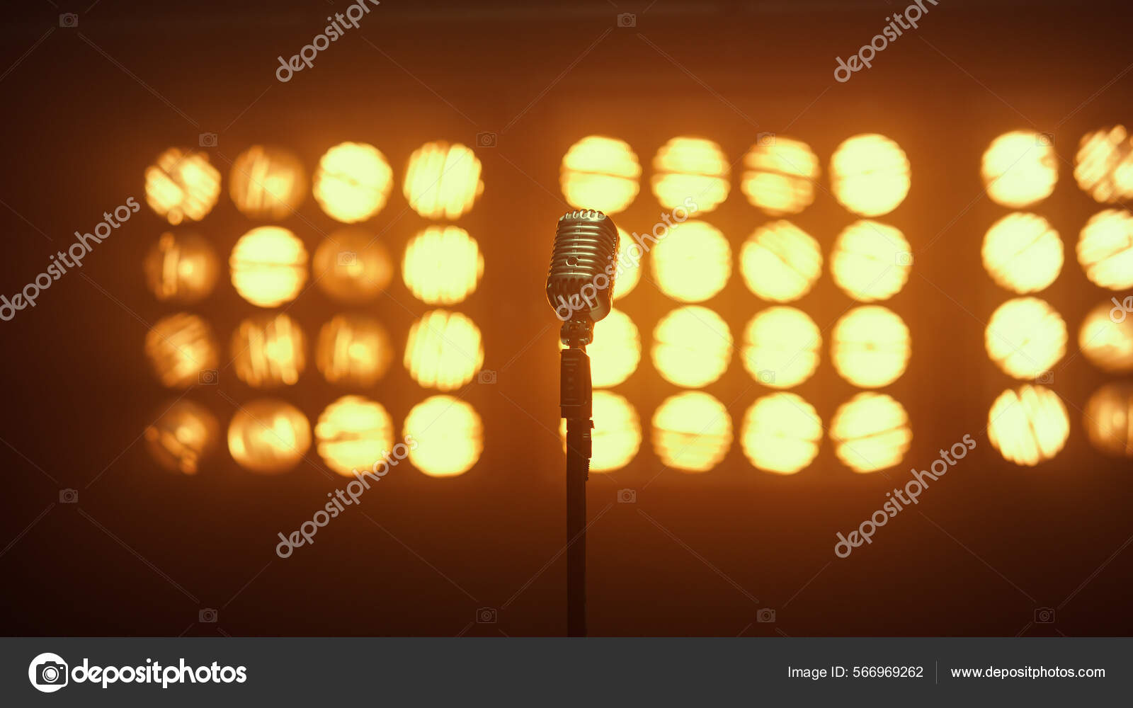 Vintage microphone standing empty stage in nightclub. Retro mic placed ...