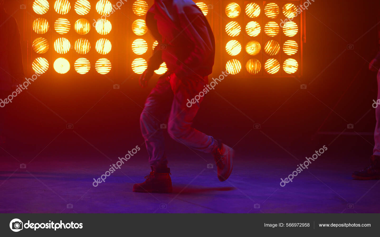 Breakdance guy showing dance elements in spotlight. Dancers performing hip-hop. — Stock Photo ...
