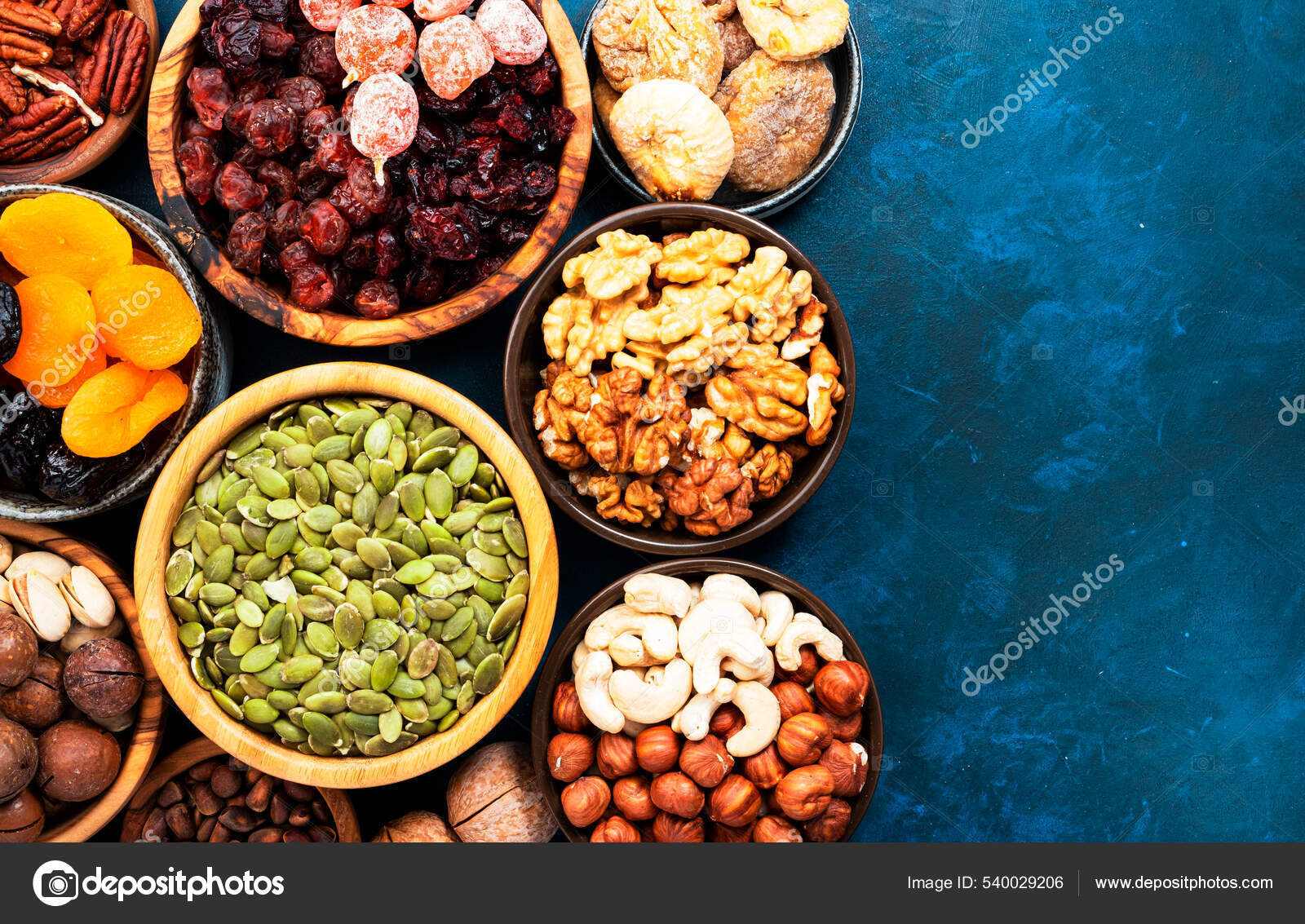 Nuts Dried Fruits Assortment Dry Apricots Figs Raisins Walnuts Almonds Stock Photo by ©5PH 540029206
