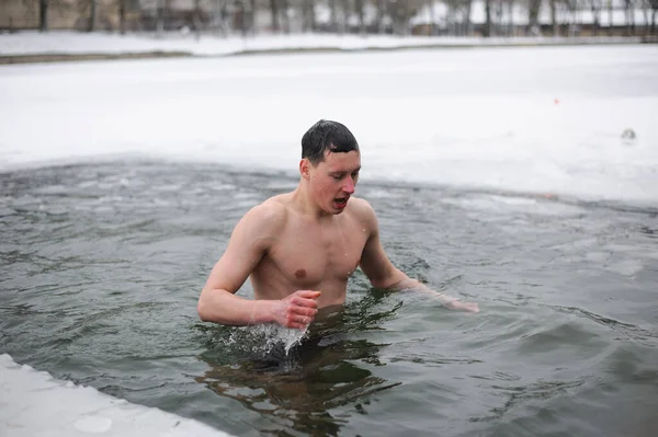 Young man in ice bath Stock Photos, Royalty Free Young man in ice bath ...