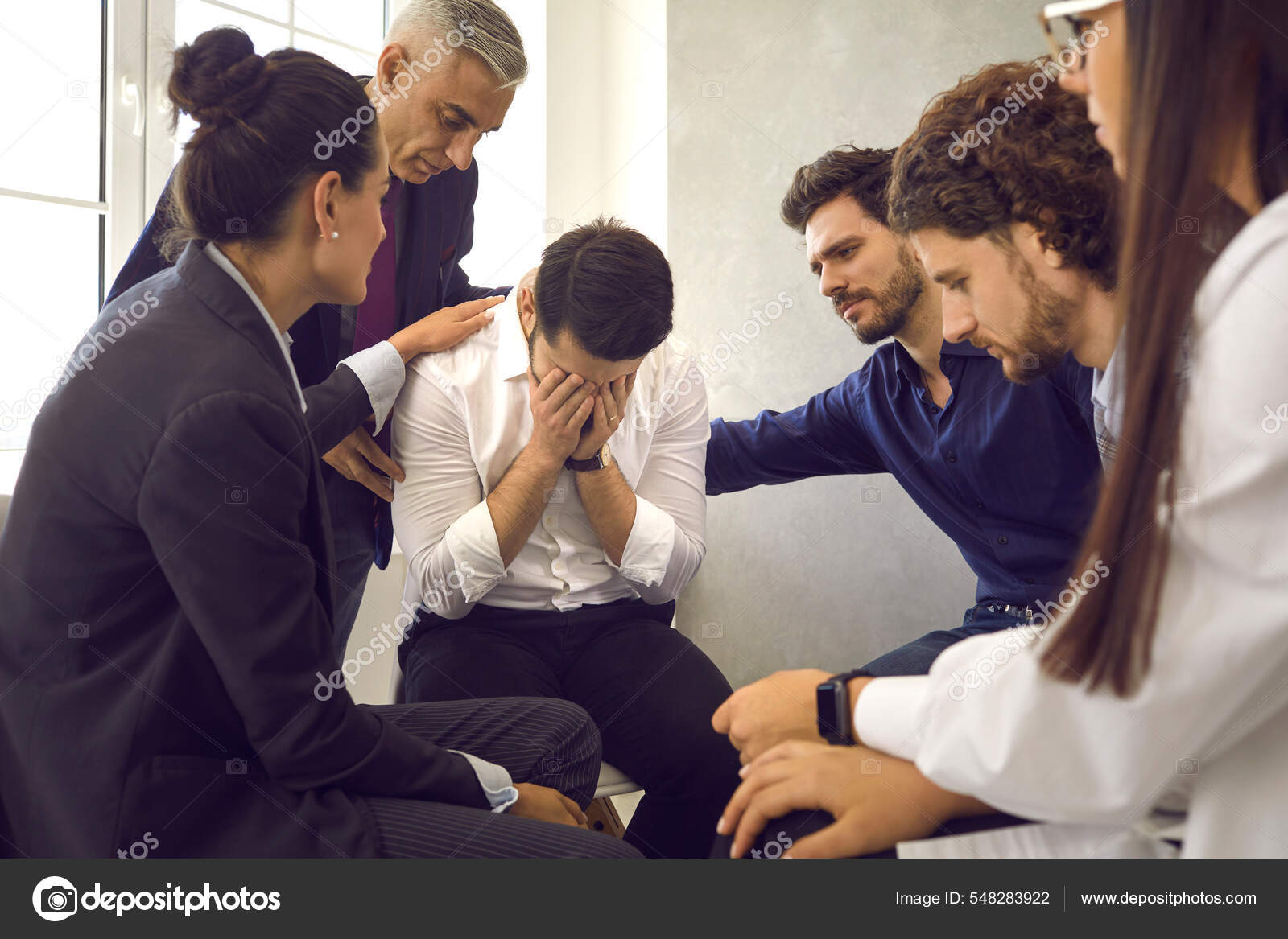 Group Of People Crying Together