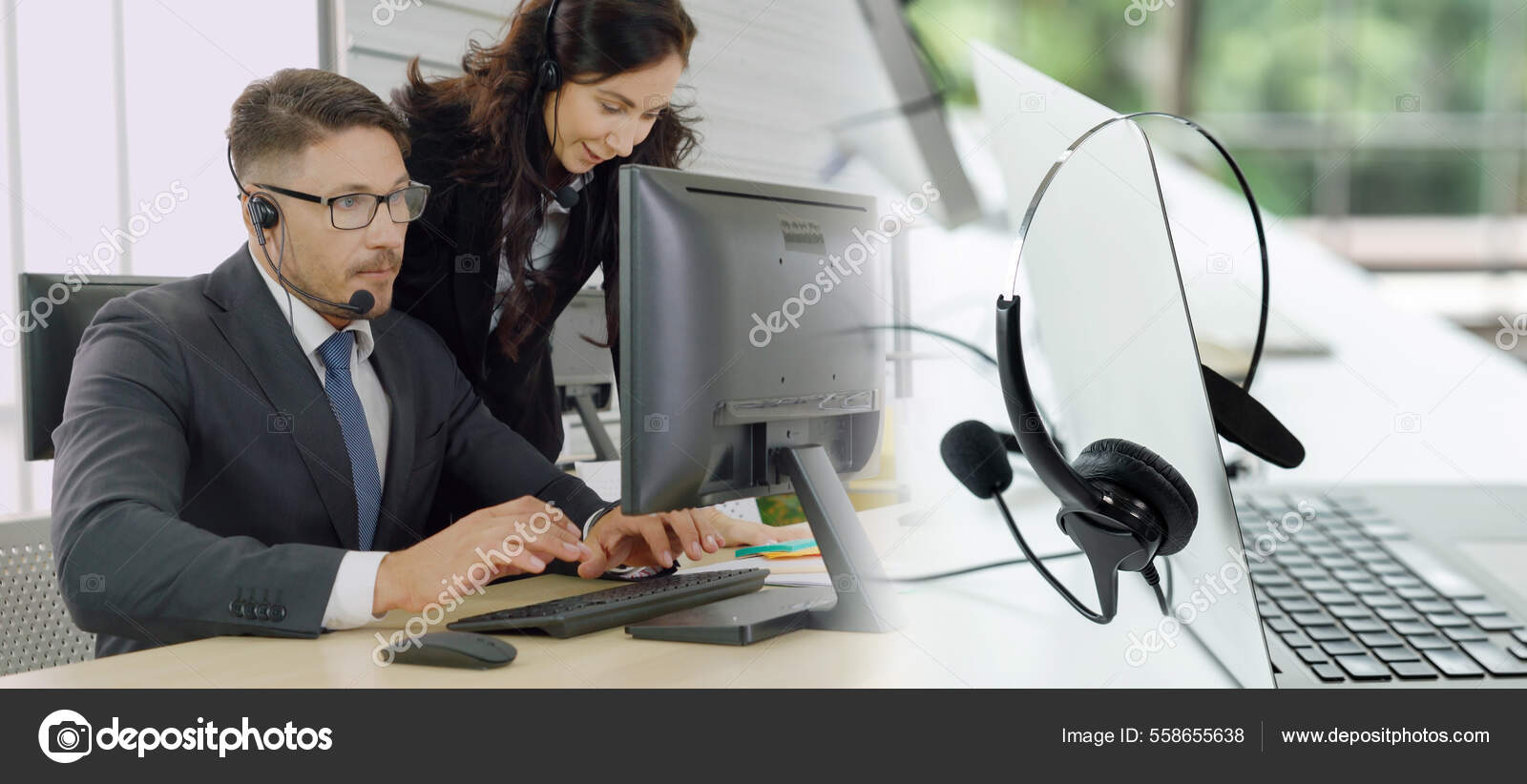 Business people wearing headset working in office broaden view — Stock ...